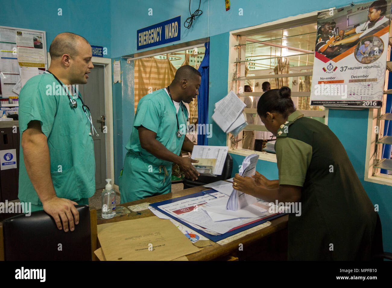 U.S. Army Sgt. 1st Class Steven Lamb, a medic, Maj. Frank Agyapong, an ...