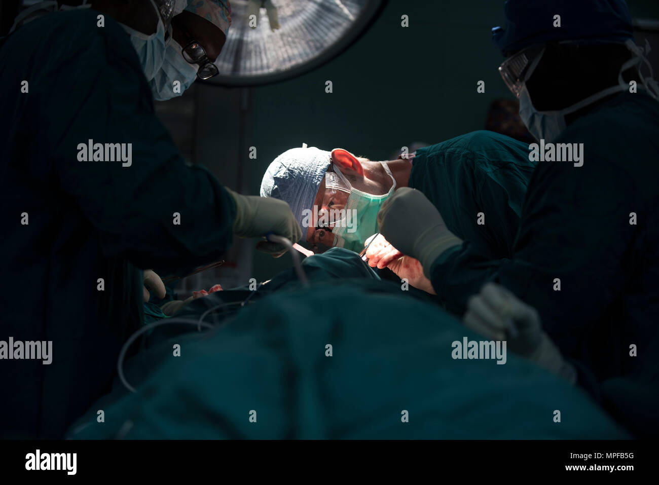 U.S. Army Lt. Col. David Tucker, an oral and maxillofacial surgeon ...