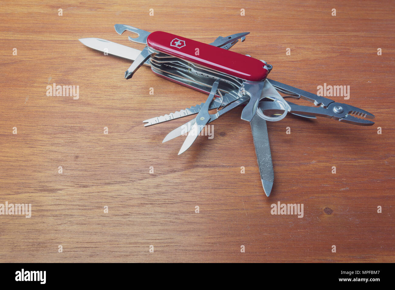 Victorinox SwissChamp pocket knife, 33 tools, on wooden background ...