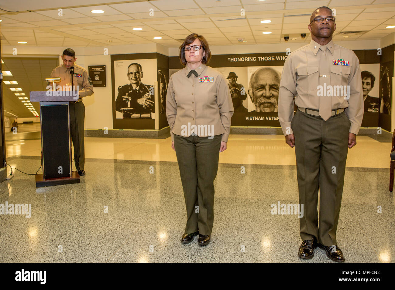 U.S. Marine Corps Col. Cheryl Blackstone, left, deputy director, G-10 ...