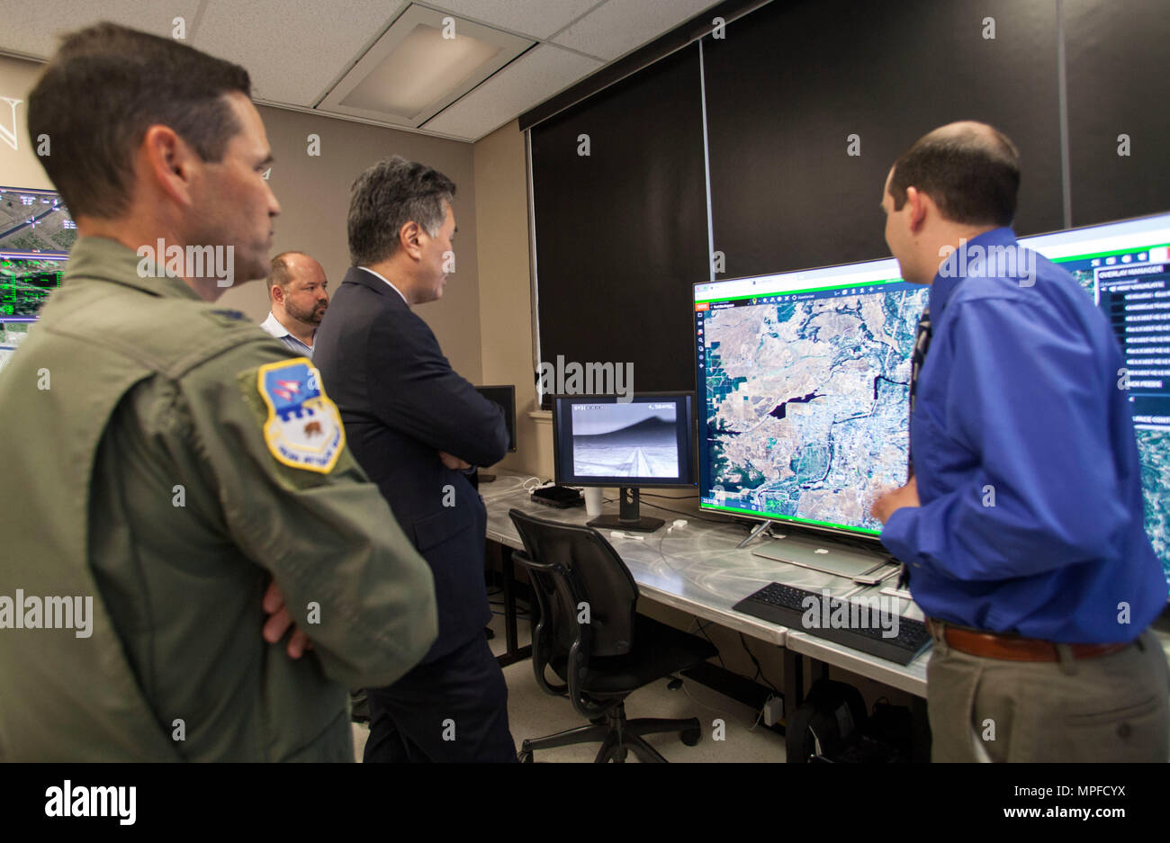 Rep. Mark Takano of California's 41st congressional district, center ...