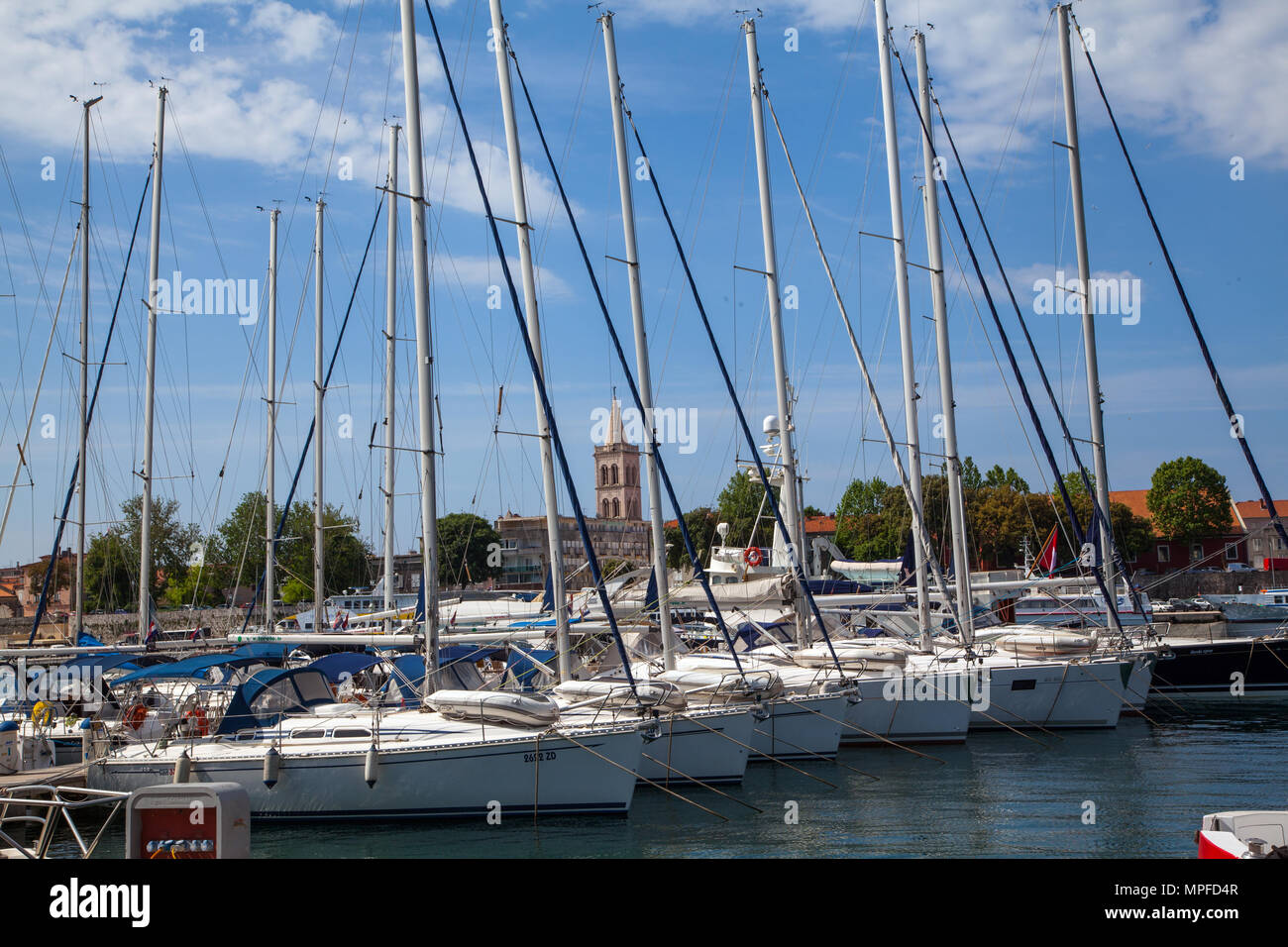Boats and yachts moored in the harbour at the Adriatic port of Zadar ...