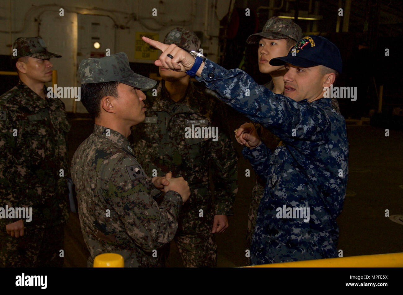 170223-N-RU971-052 SASEBO, Japan (Feb. 23, 2017) Lt. j.g. Ray Norris ...