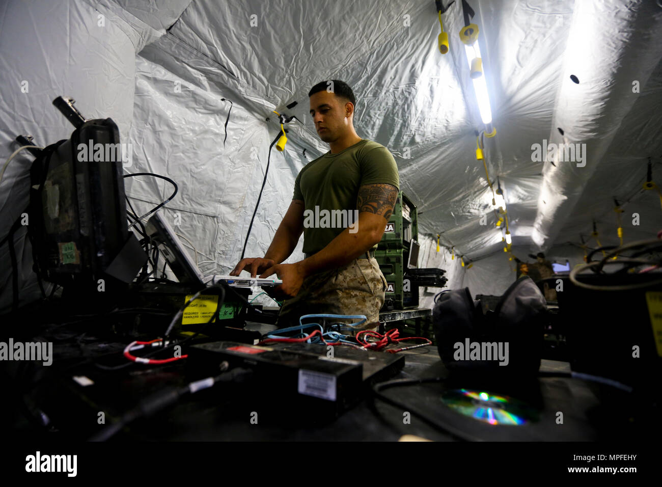 U.S. Marine Sgt. Nicholas Perez, a cyber network specialist with ...