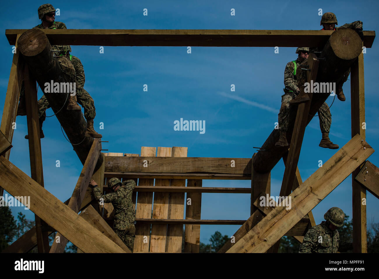 Sailors from Naval Mobile Construction Battalion (NCB) 133 work ...