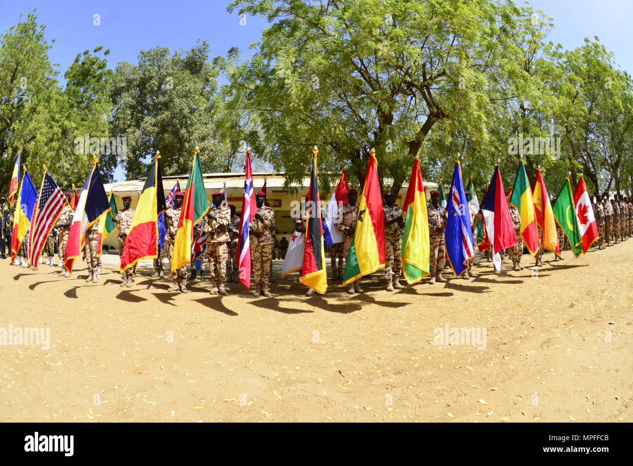 Soldiers of the Chadian Army raise the flags of partner nations ...