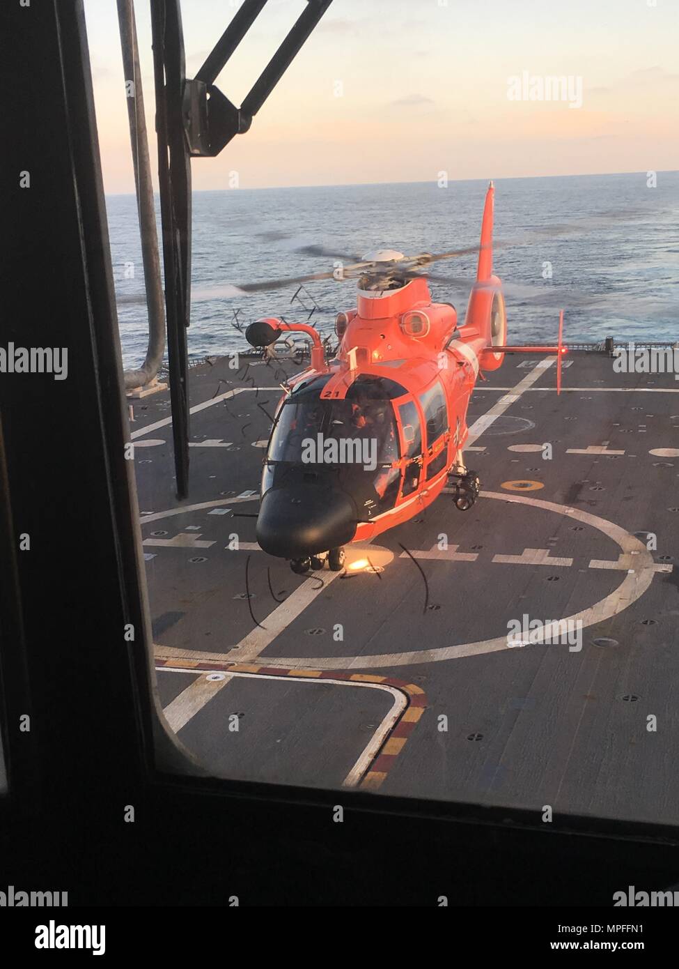 170216-N-ZZ999-008 PACIFIC OCEAN – A U.S. Coast Guard helicopter lands ...