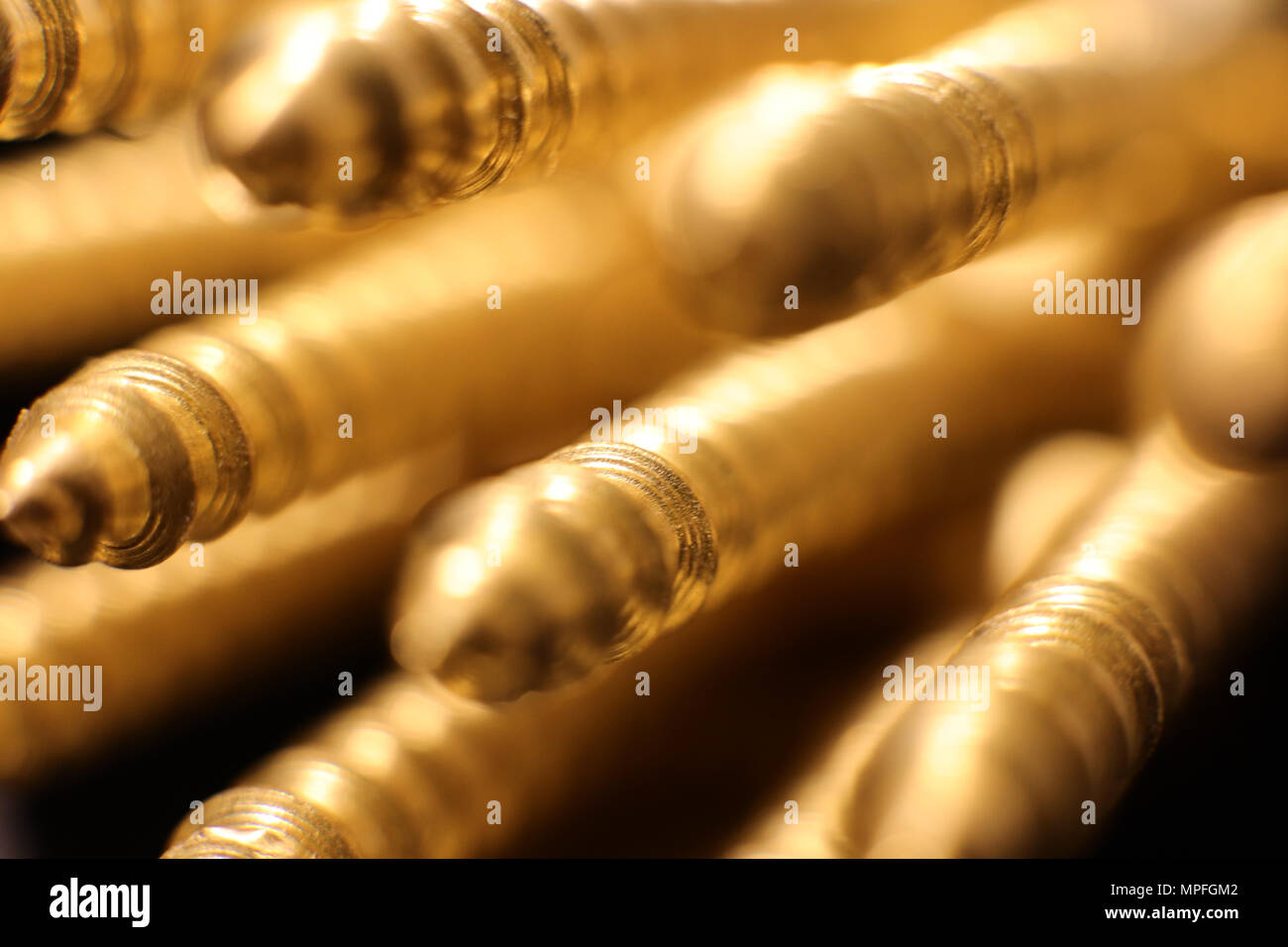 Golden screws hi-res stock photography and images - Alamy