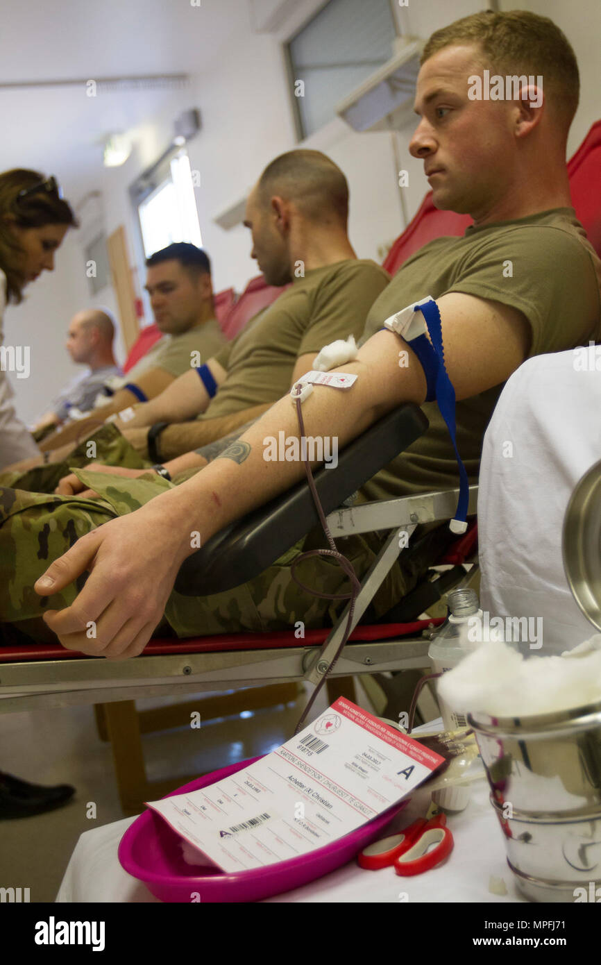 Soldiers, assigned to Multinational Battle Group-East, donate blood to ...
