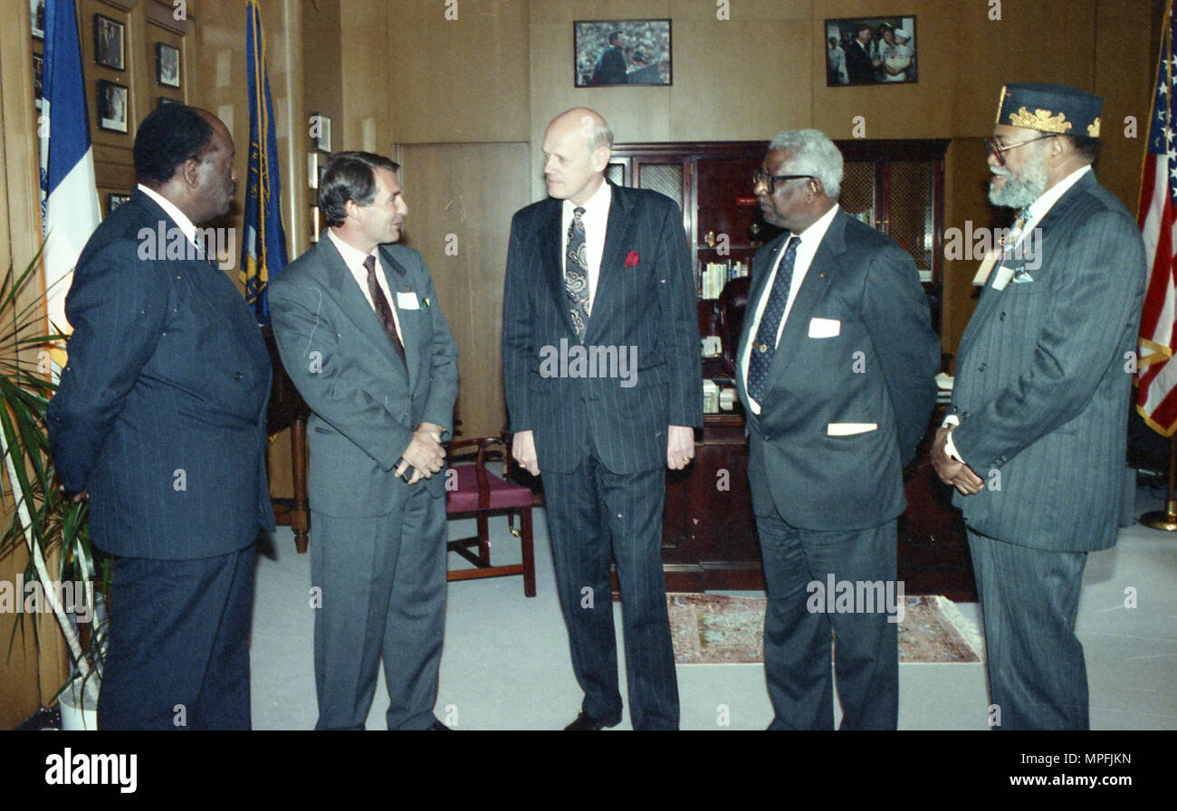 FIVE MEN ARE HAVING A CONVERSATION IN A OFFICE Stock Photo - Alamy