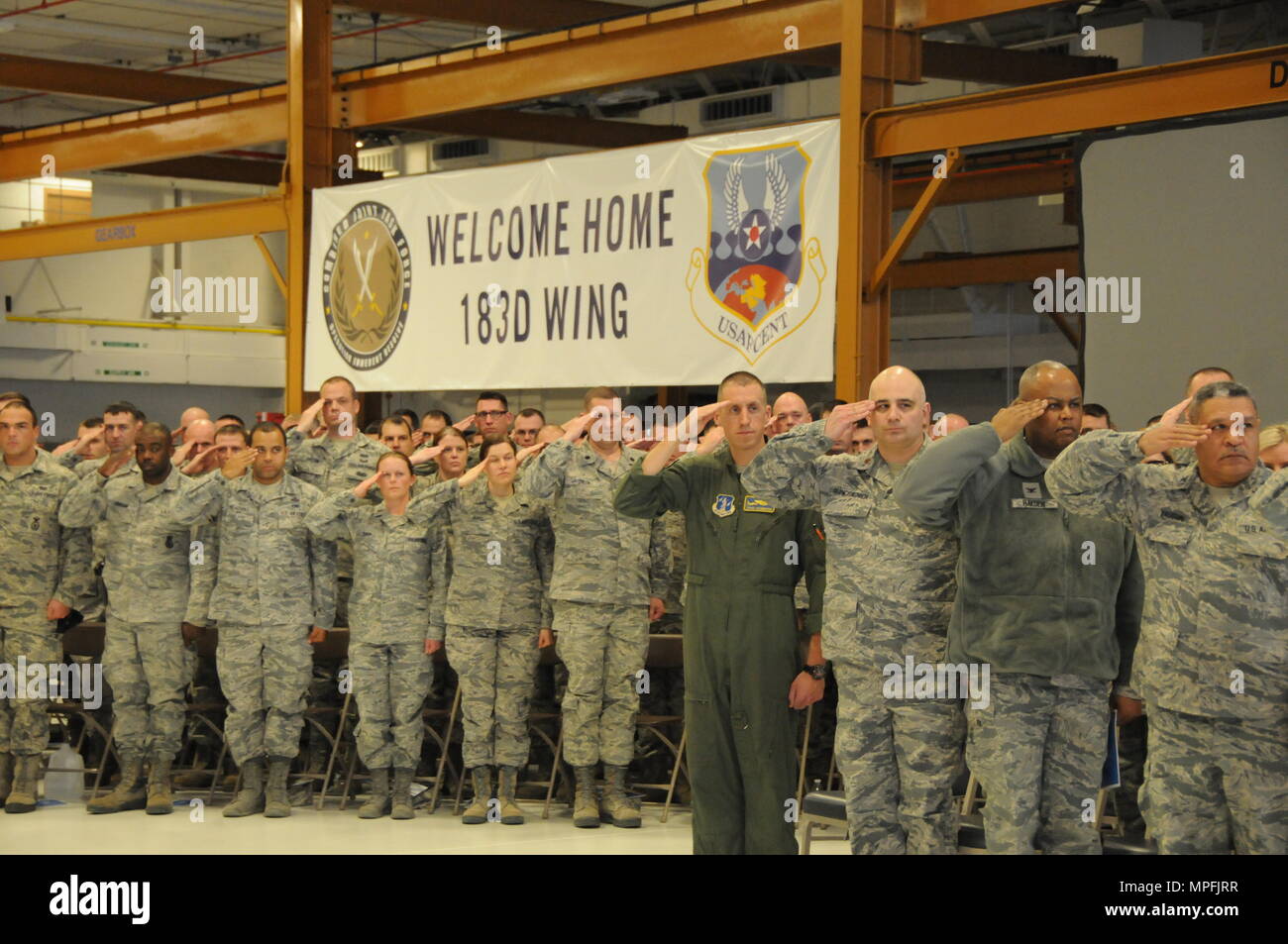 Members of the 183d Fighter Wing salute as the unit is redesignated as ...