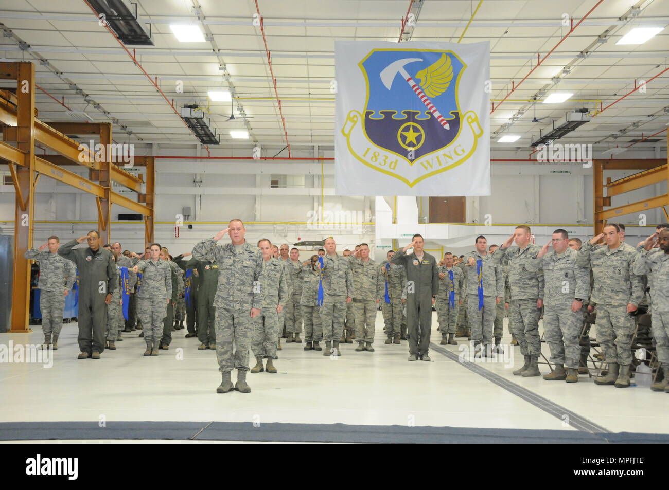 Col. John Patterson, Commander, 183d Fighter Wing, salutes as the order ...