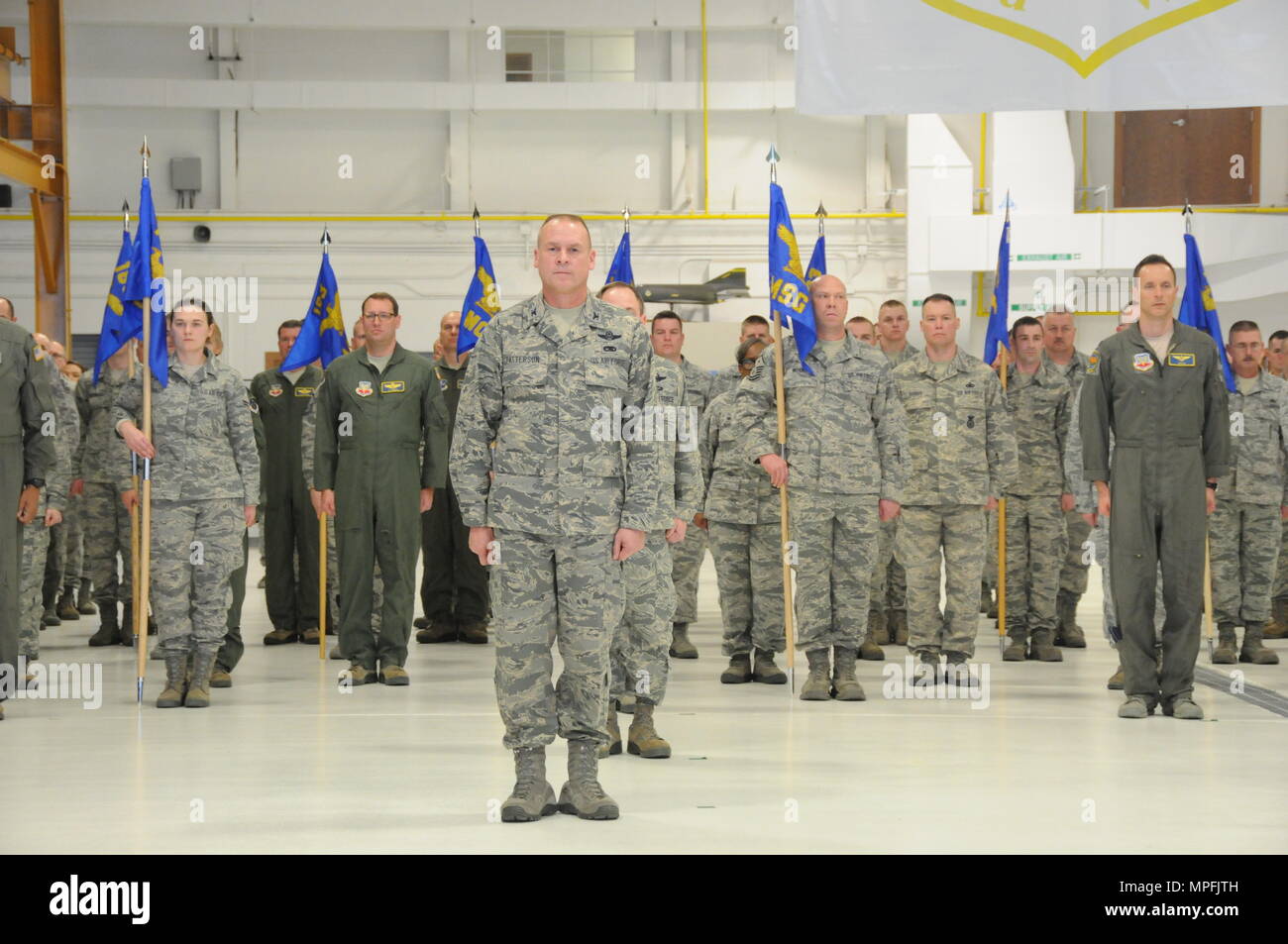 Col. John Patterson, Commander, stands in front of the newly designated ...