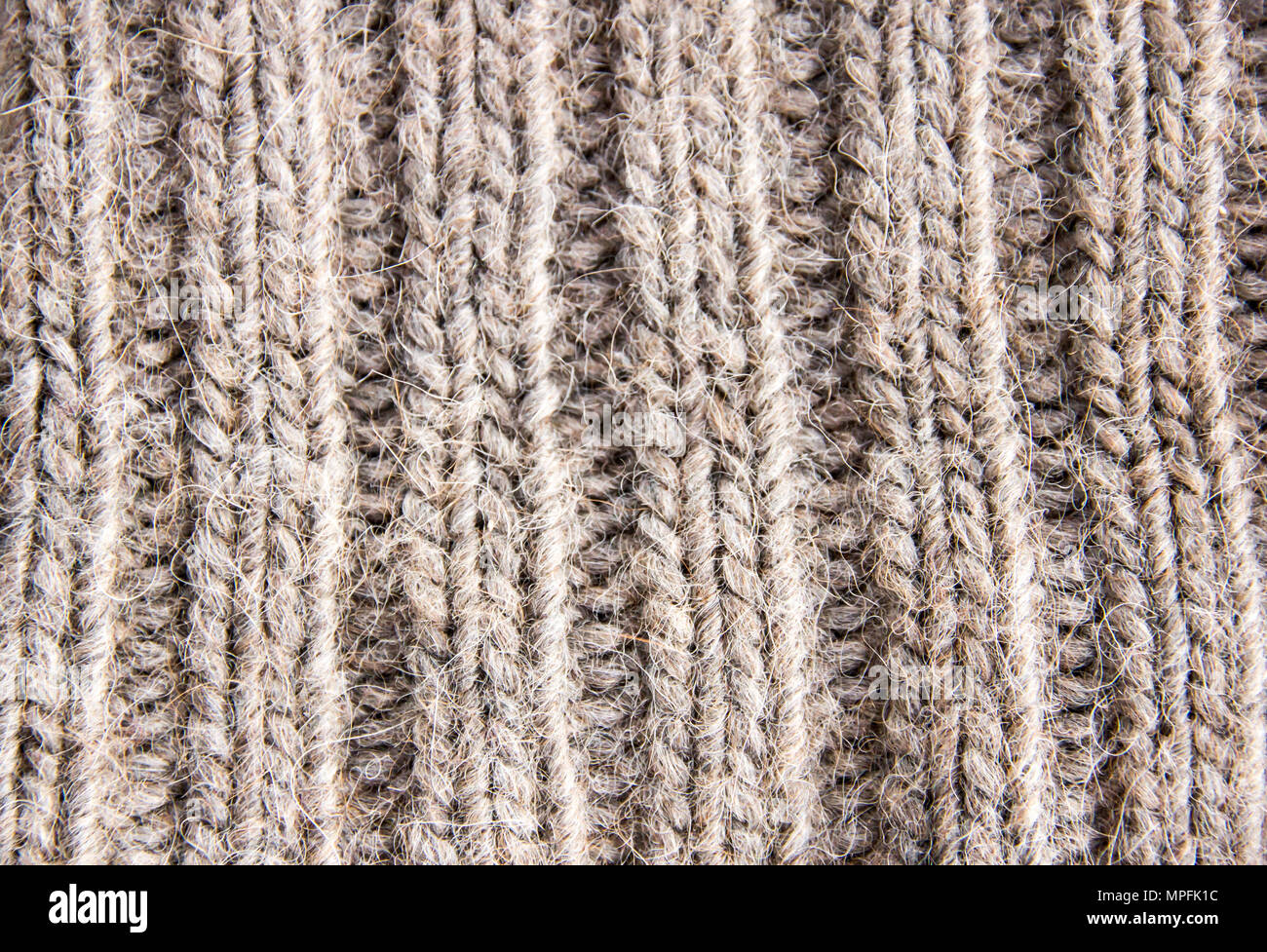 Texture knitted surface with pattern closeup Stock Photo - Alamy