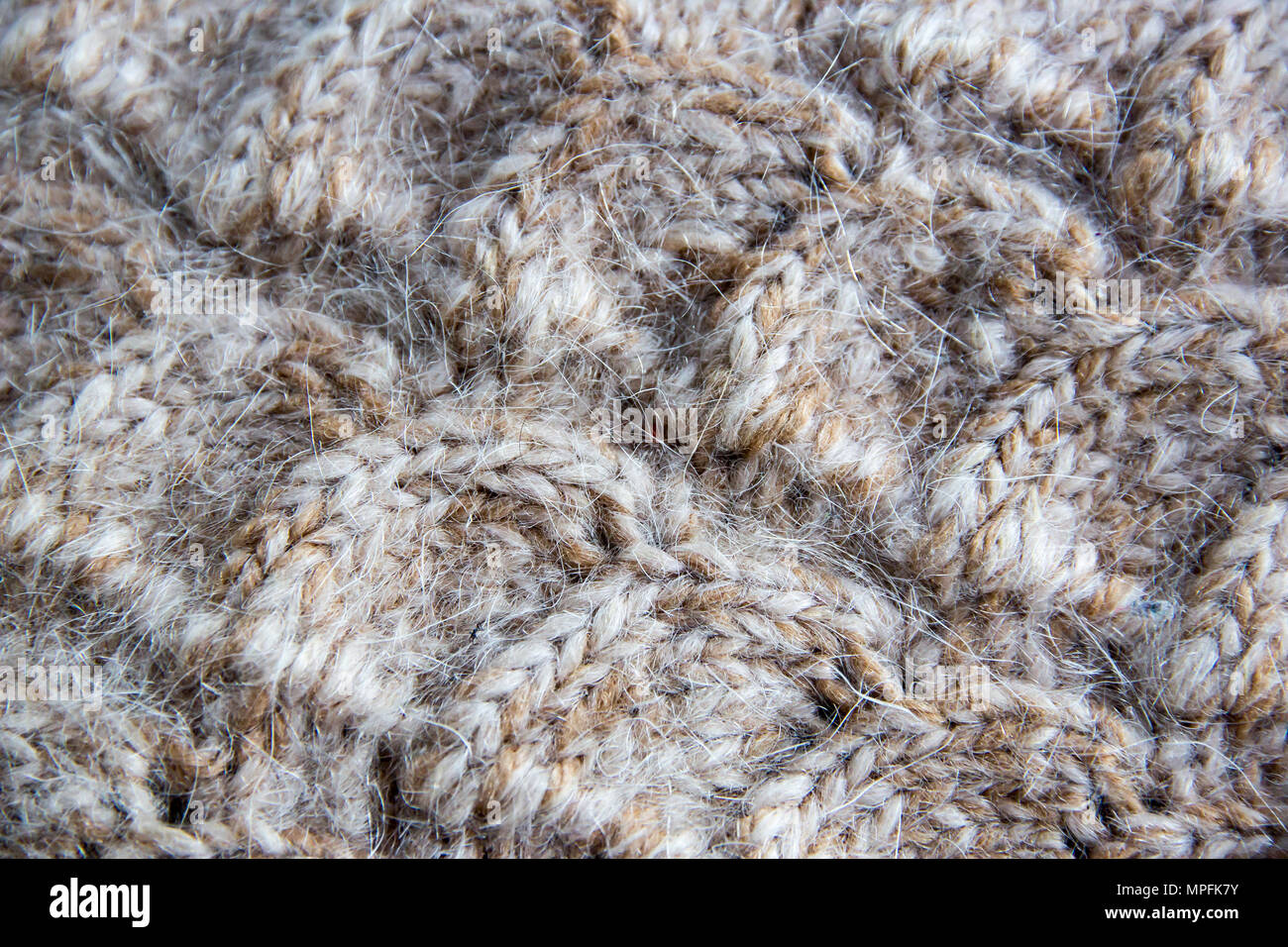 Texture knitted surface with pattern closeup Stock Photo - Alamy