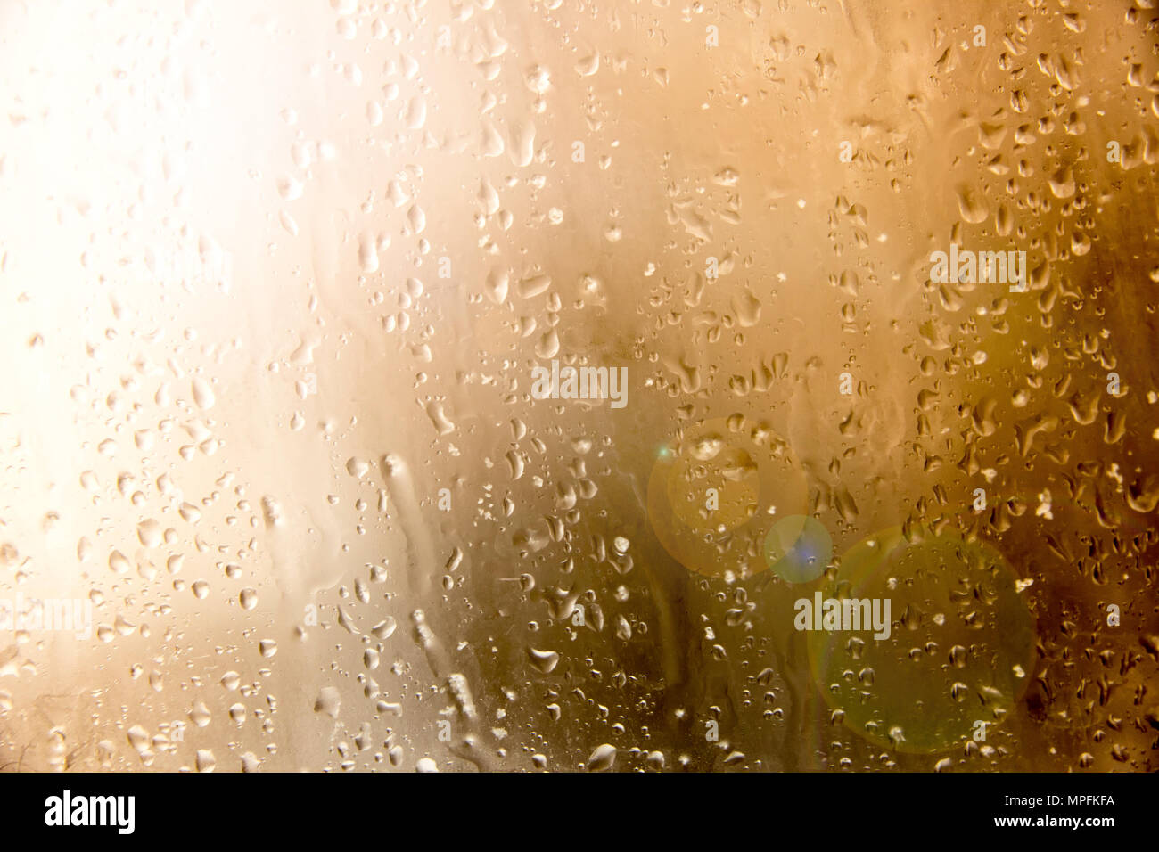 Drops rain on window glare hi-res stock photography and images - Alamy