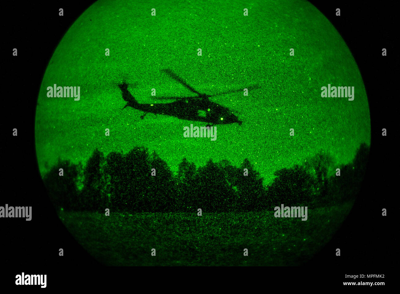 A U.S. Navy MH-60S Seahawk flies a rescue mission during Emerald ...