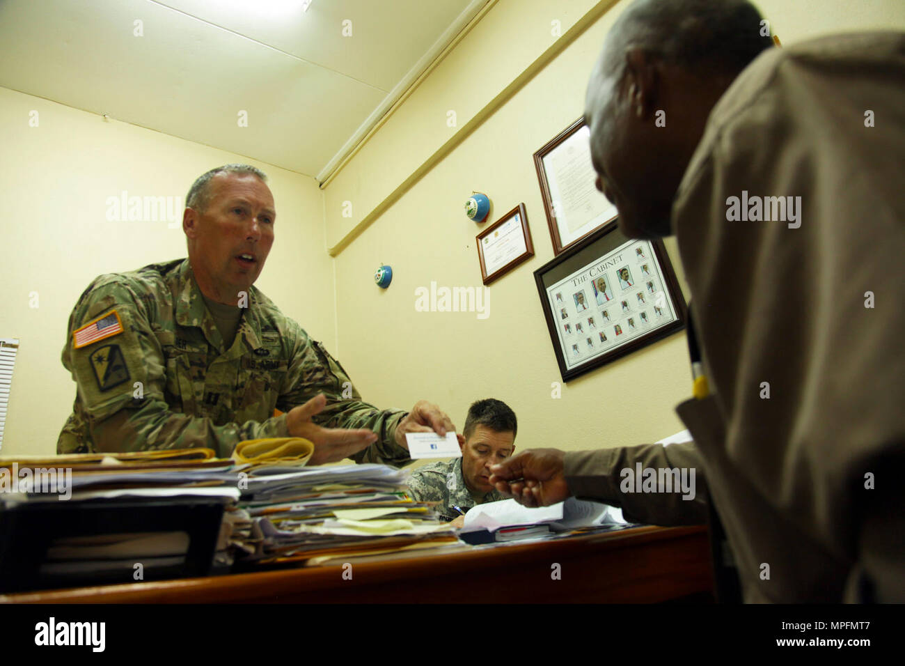 U.S. Army Capt. Andrew Baer and Sgt. 1st Class Eric Ritchey, with the ...