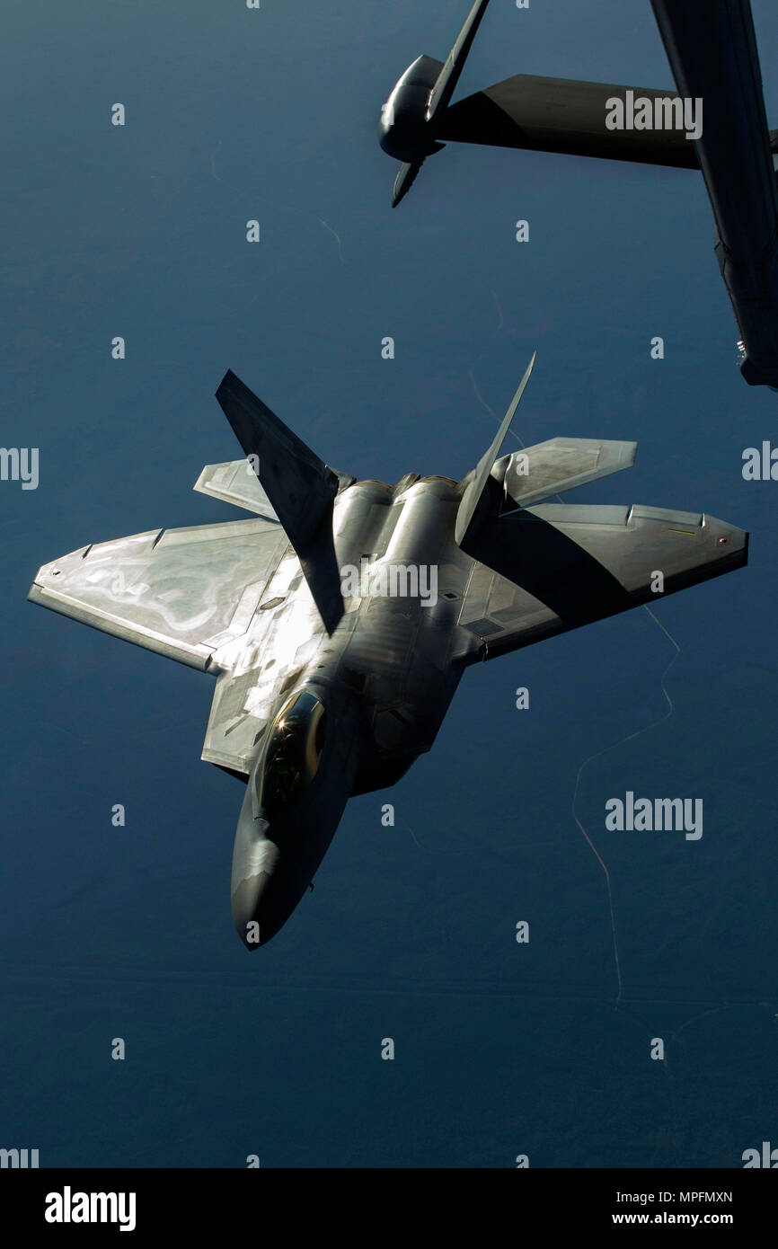 An F-22 Raptor, a fifth-generation stealth fighter aircraft powered by ...