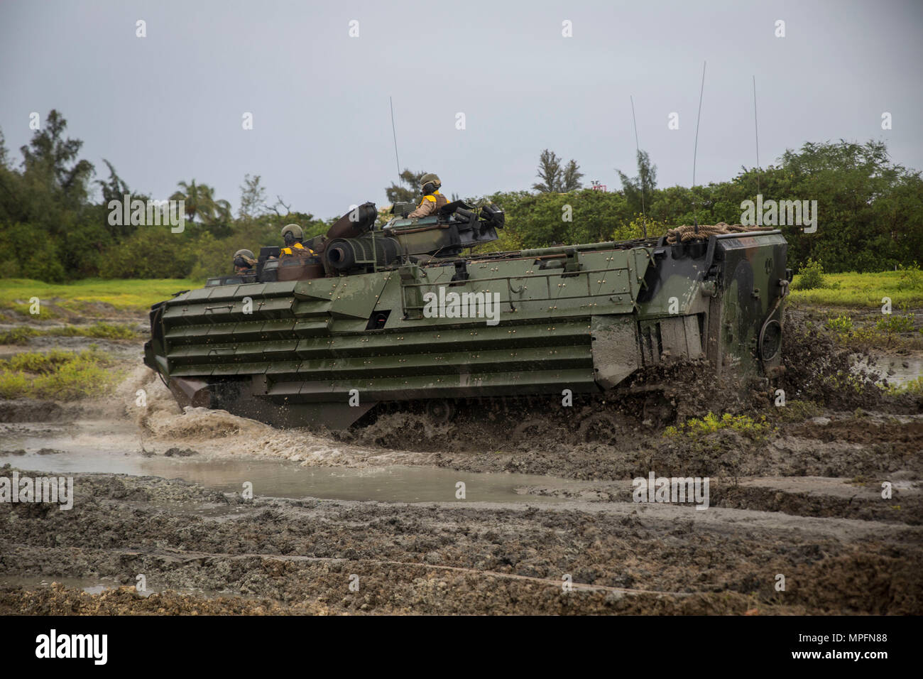 MARINE CORPS BASE HAWAII – Marines with Combat Assault Company, 3rd Marine Regiment, maneuver an ...
