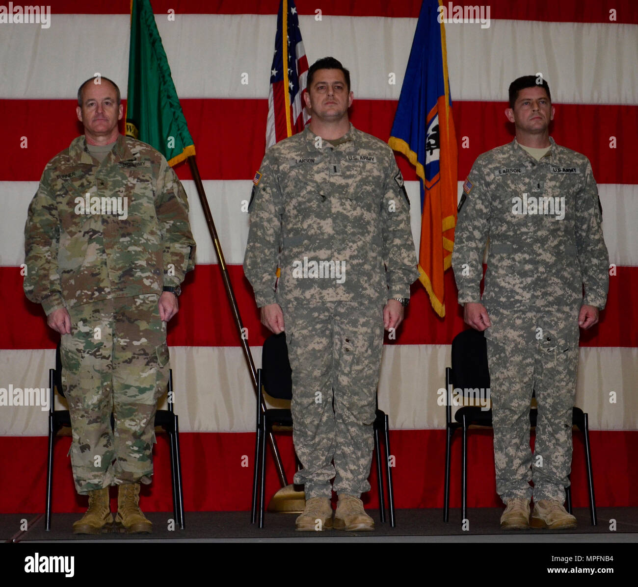 Brig. Gen. Wallace Turner (Left) stands at attention while promotion ...