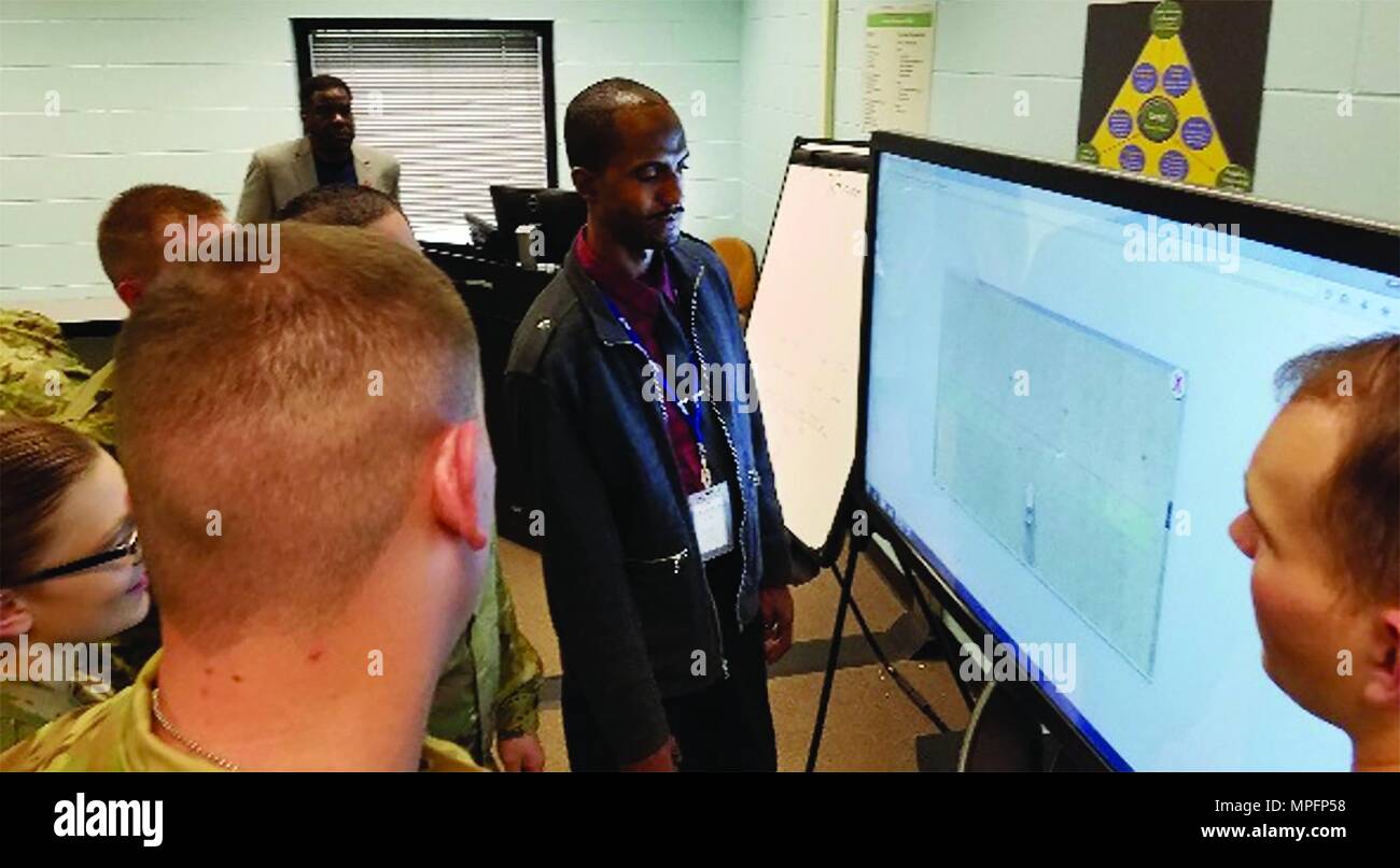 An instructor and students of the 92-Foxtrot Petroleum Supply ...