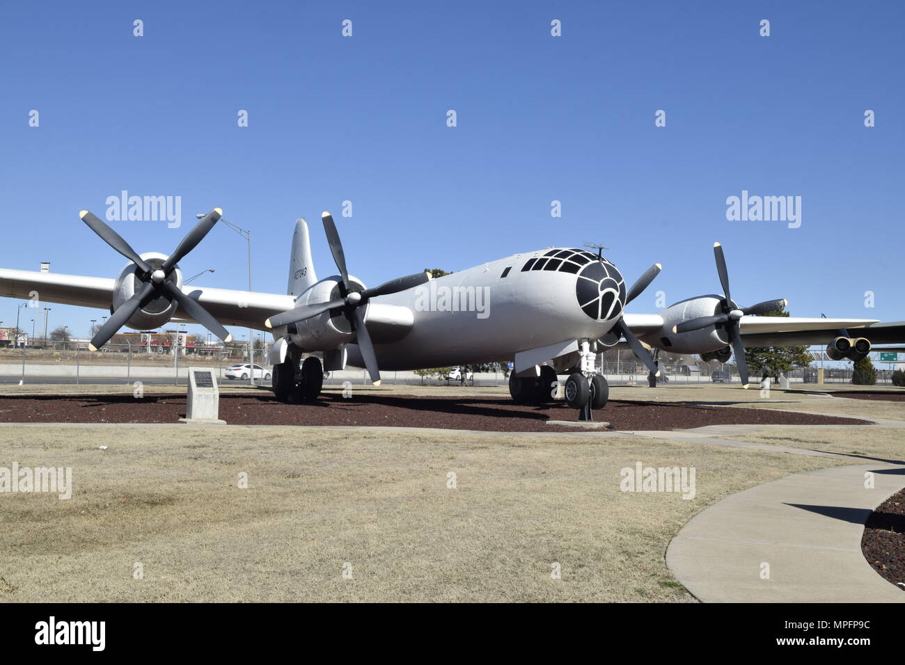 The four-engined Boeing WB-29 Superfortress wears a white paint scheme ...