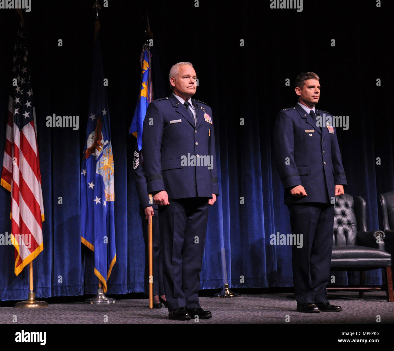 Commander of 22nd Air Force, Maj. Gen. John Stokes (left) prepares to ...