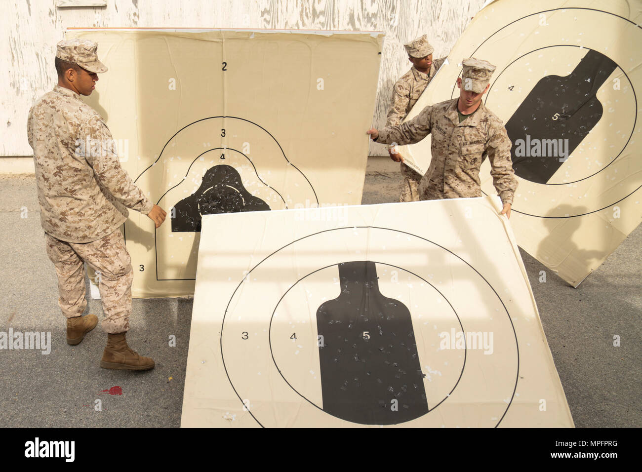 U.S. Marine Corps recruits Kevin Santiago-Rosa and Tyler Guertin with ...