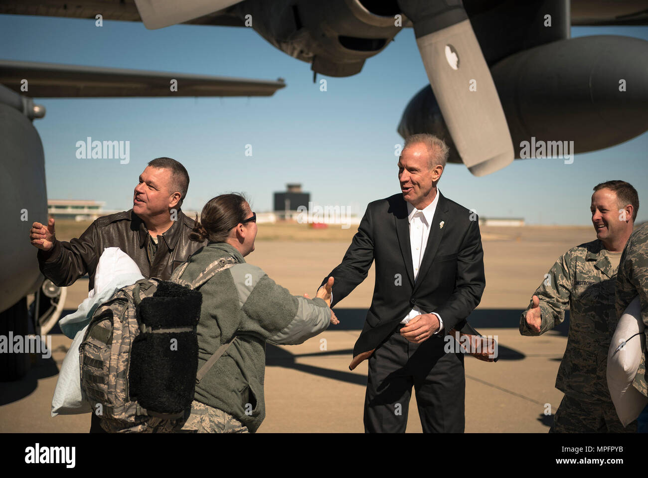 From left, U.S. Air Force Col. William Robertson, the commander of the ...