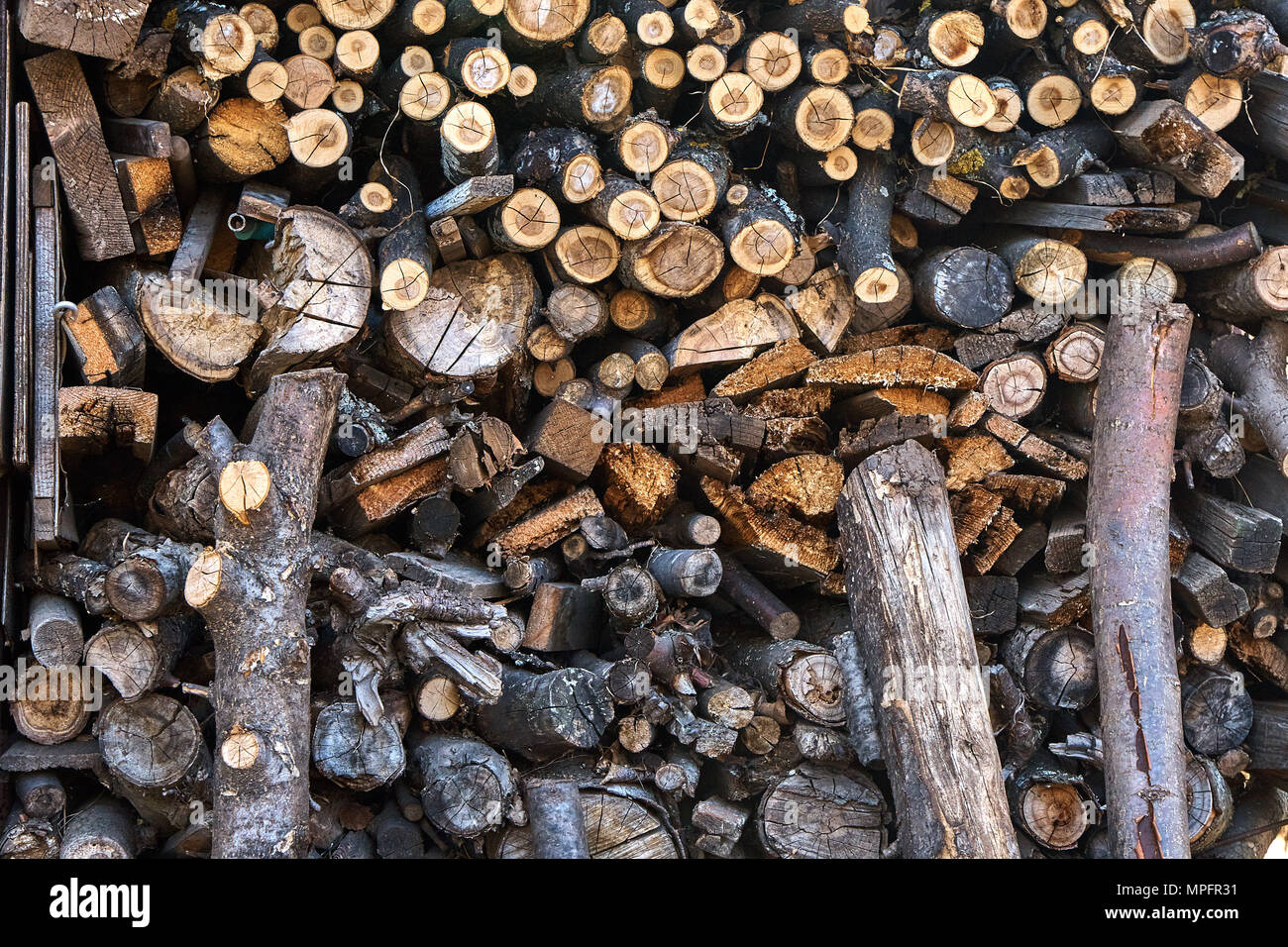 Large stack of firewood from different wood in the countryside Stock ...