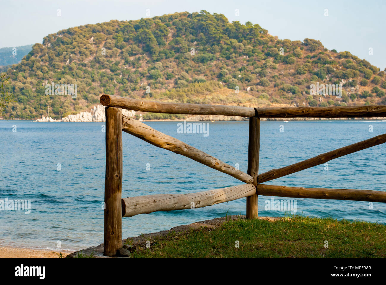 Wooden fence on the beach of the resort area in Turkey Stock Photo - Alamy