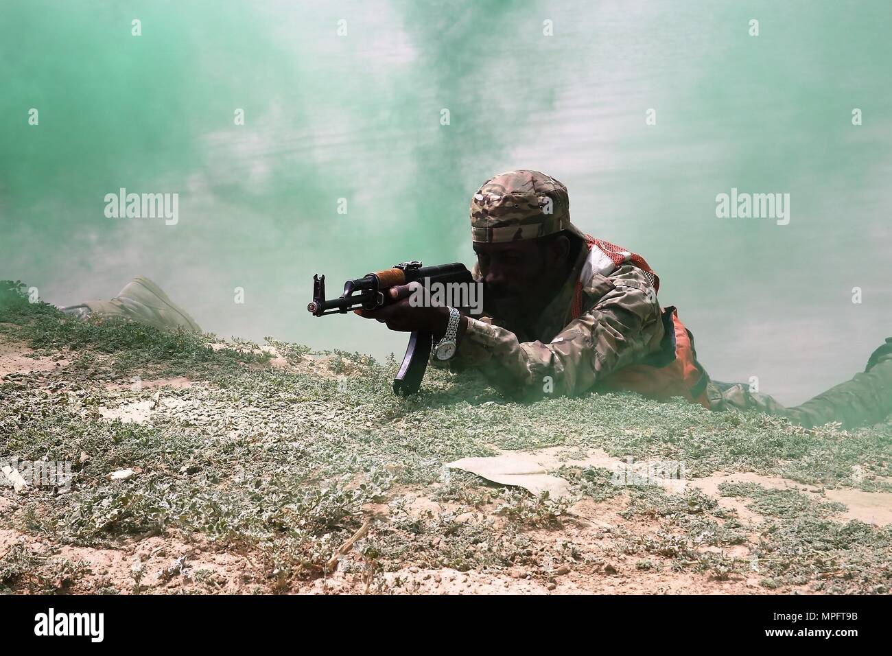 A Chadian Soldier conduct a beach infiltration training exercise as ...