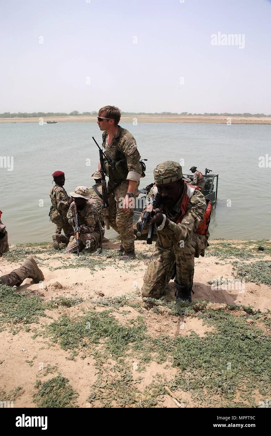 Chadian Soldiers conduct a beach infiltration training exercise as part ...