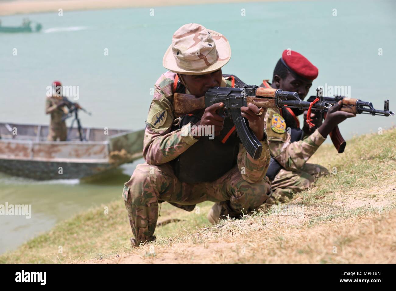 Chadian Soldiers conduct a beach infiltration training exercise as part ...