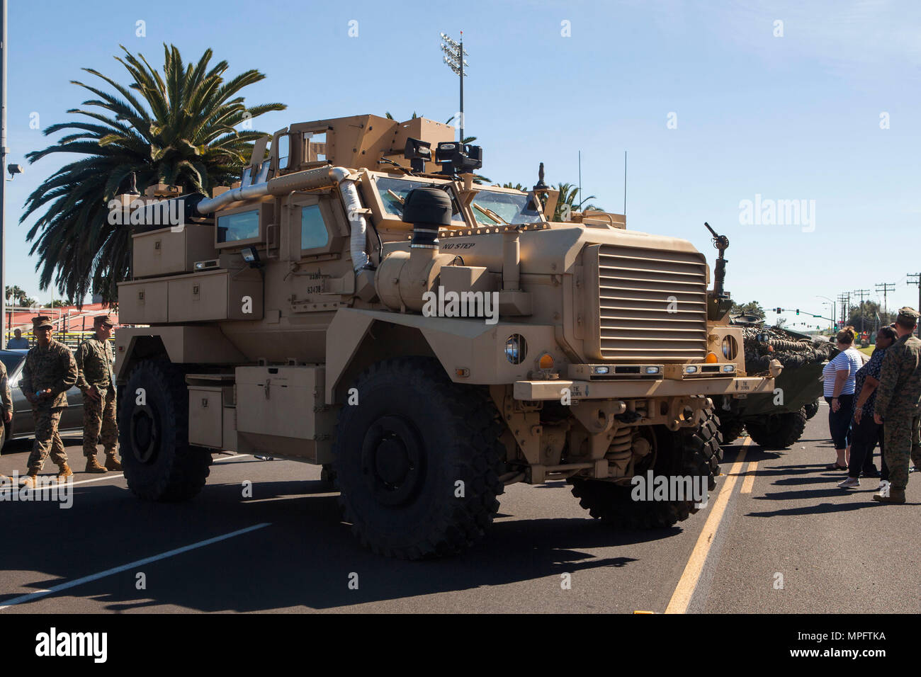 A U.S. Marine Corps MRAP vehicle is displayed at the Battle Color ...