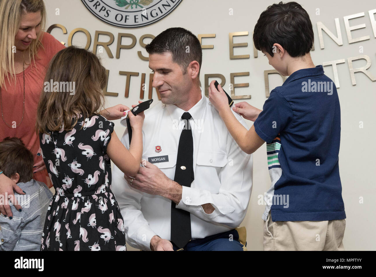 Lt. Col. Brad Morgan's son Aiden and daugther Ali place shoulder boards ...