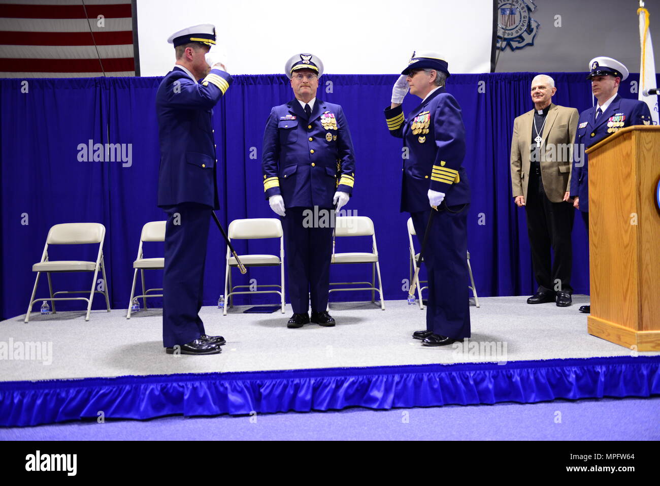 Capt. Linda Sturgis (right) relieves Capt. Joe Raymond (left) as the ...
