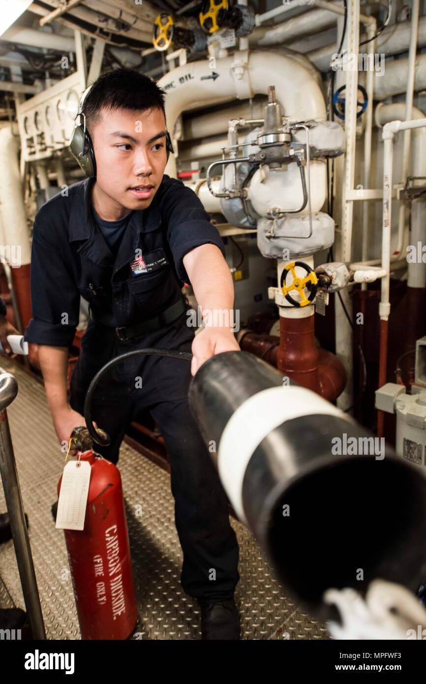 170309-N-GR361-032 EAST CHINA SEA (March 9, 2017) Fireman Toan Pham ...