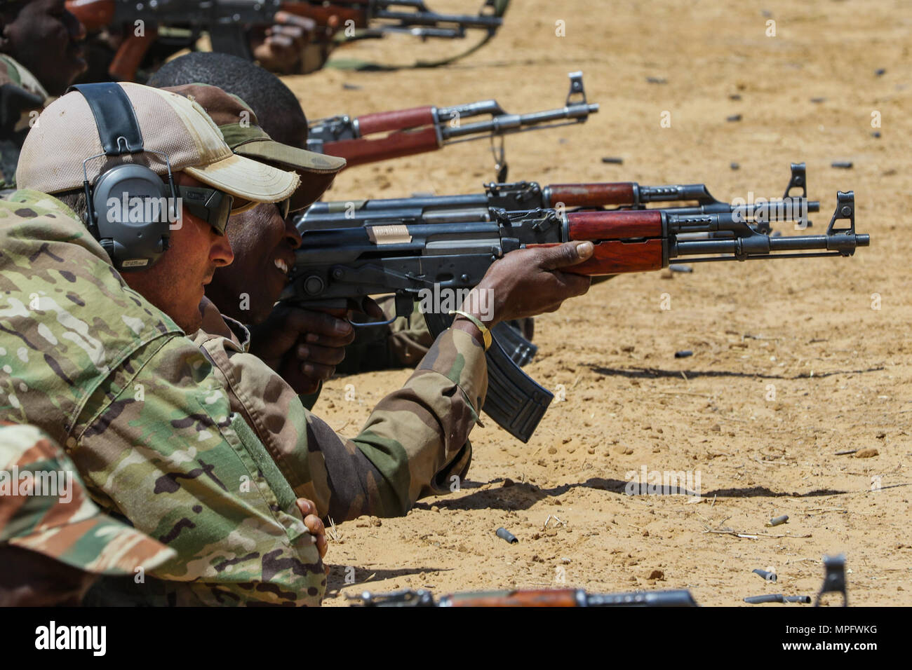 A member of Canadian Special Operations Forces Command coaches a member ...