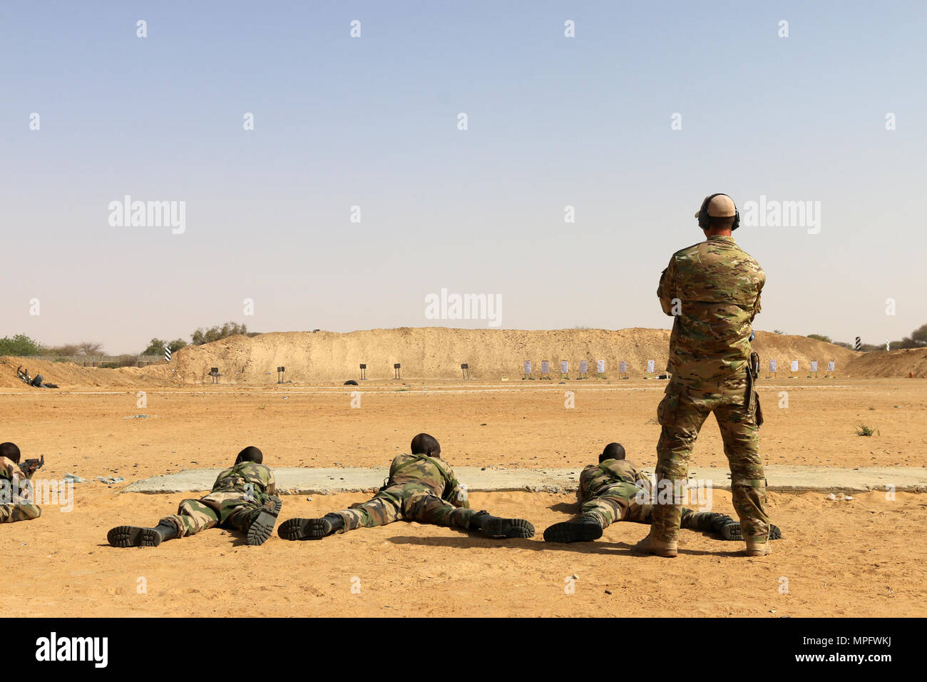 A member of Canadian Special Operations Forces Command coaches members ...
