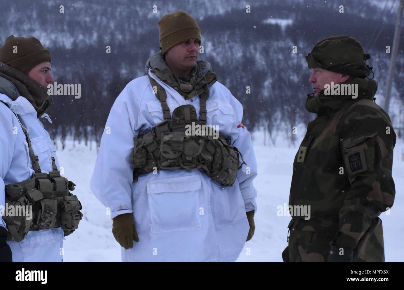 Maj. Gen. Odin Johannessen, Norwegian Army Chief of Staff, speaks with ...