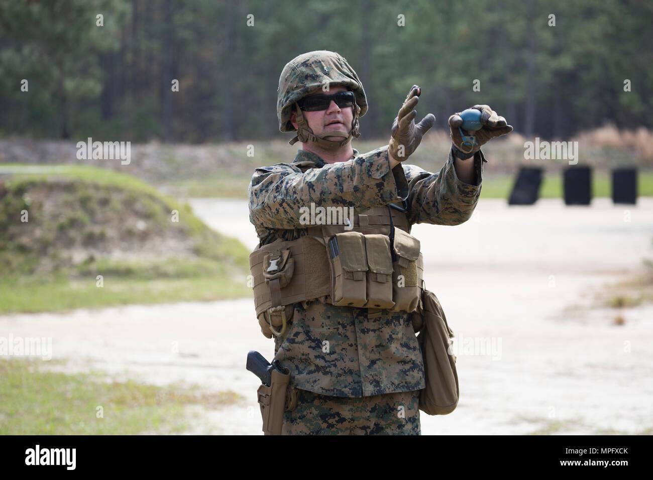 U.S. Marine Corps Gunnery Sgt. Nicholas W. Miller, a radio chief with ...