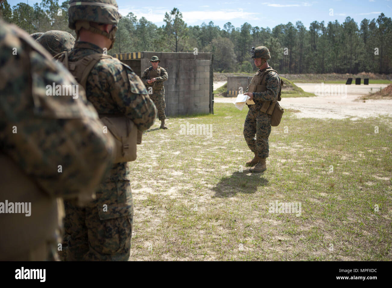 U.S. Marine Corps Gunnery Sgt. Justin M. Crawn, right, a platoon ...