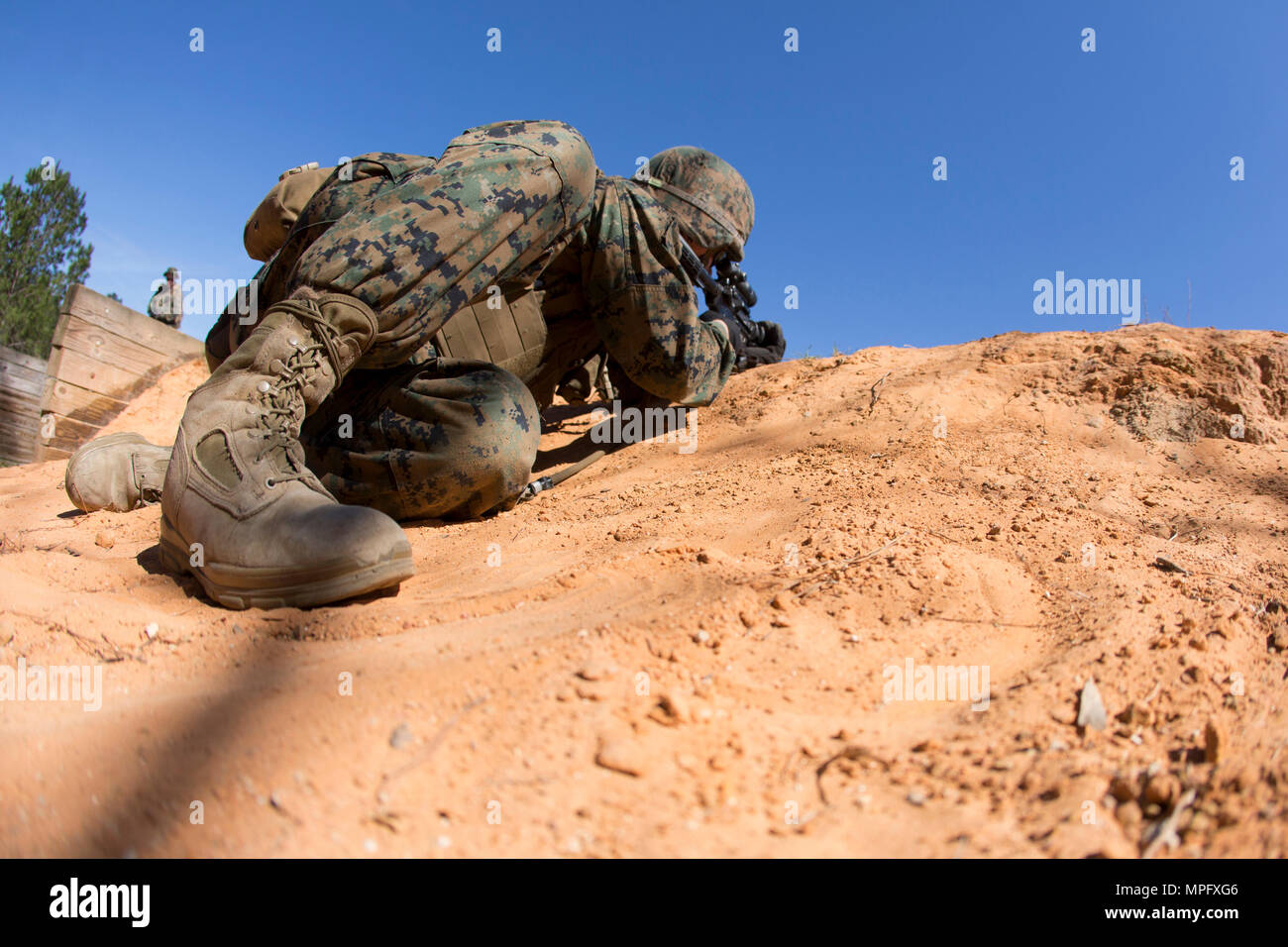 U.S. Marine Corps Cpl. Mark P. Padilla, an assault amphibian vehicle ...