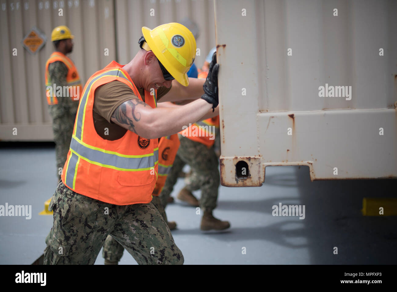 Boatswain’s Mate 2nd Class Anthony Chaplin, assigned to Navy Cargo ...