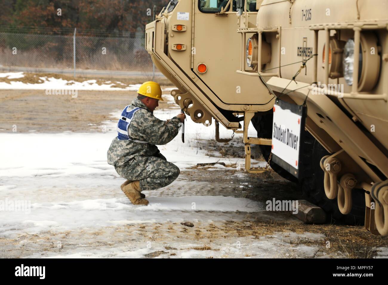 A student with the 13th Battalion, 100th Regiment’s 89B10 Ammunition ...
