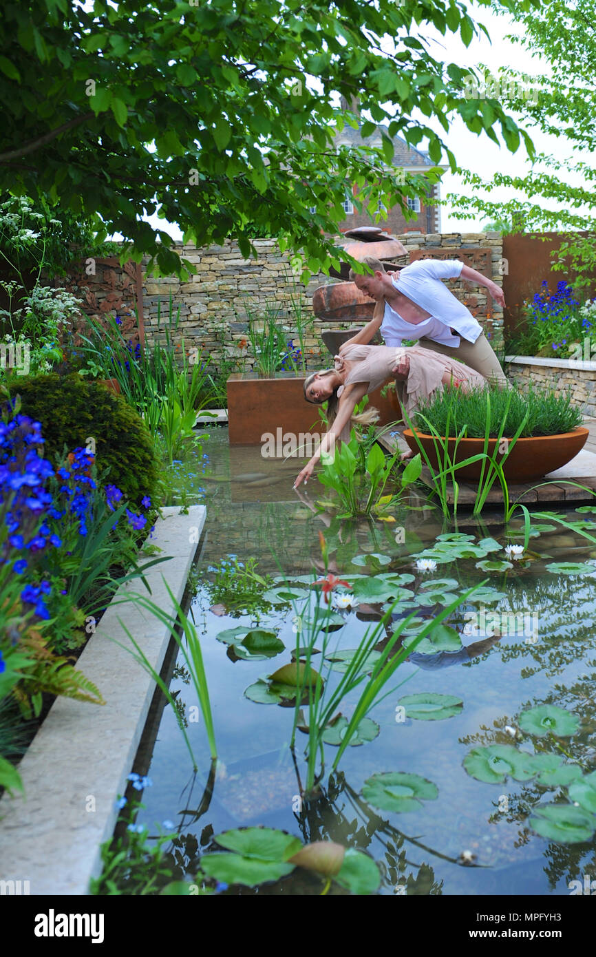 Dancers performing in the Silent Pool Gin Garden (designed by David ...