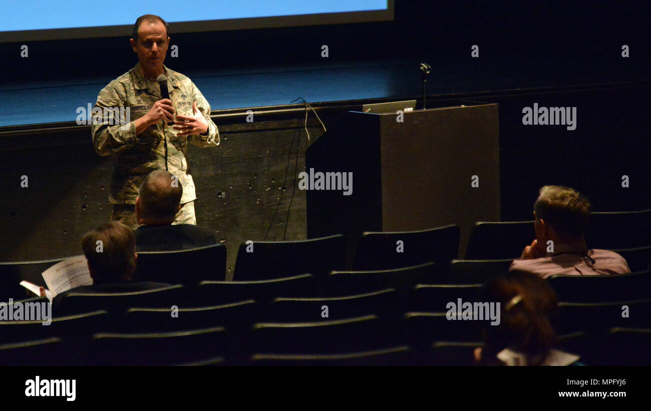 Col. Eric Froehlich, 377th Air Base Wing commander, addresses members ...