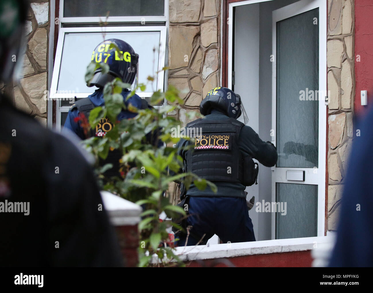RETRANSMISSION, AMENDING PICTURE DATE TO TODAY. A dawn raid with police ...